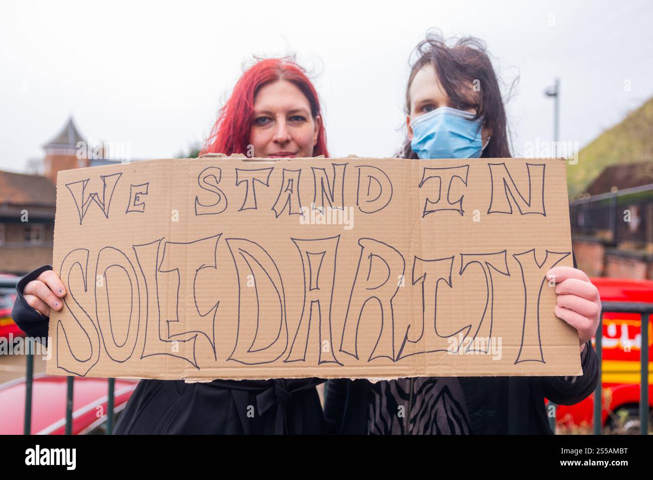 Lincoln, UK. 13 JAN, 2025. "We Stand in Solidarity" sign as activists ...