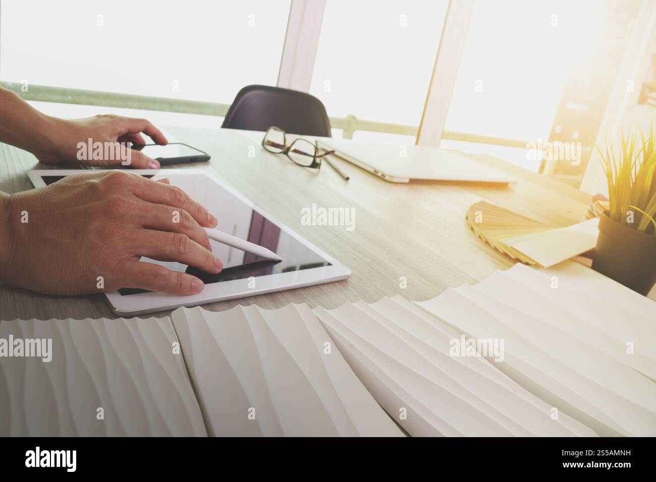 Interior designer hand working with new modern computer laptop and ...