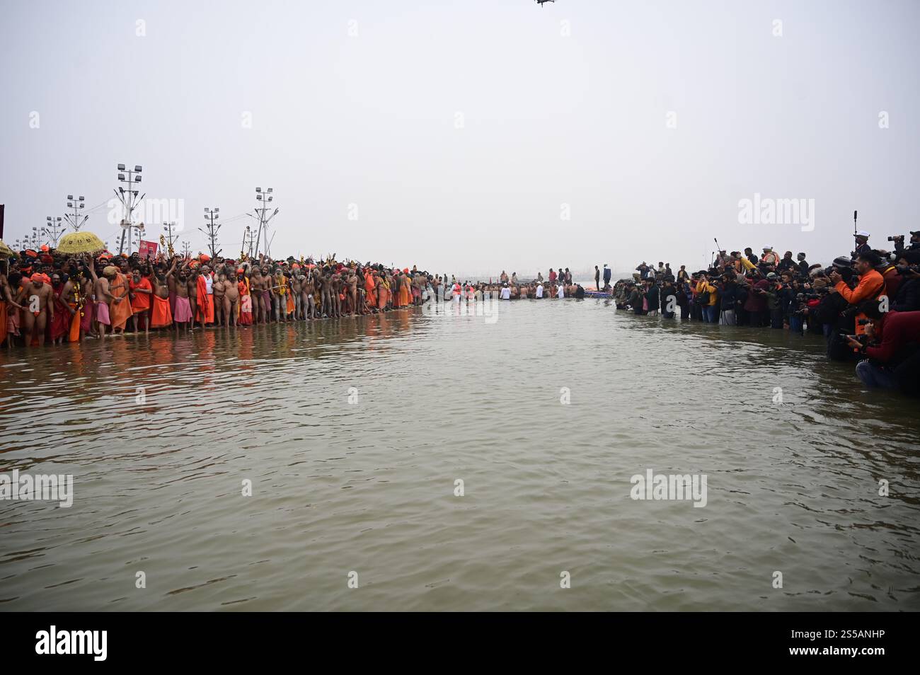 Prayagraj, Uttar Pradesh, India. 14th Jan, 2025. Prayagraj: Sadhus take ...