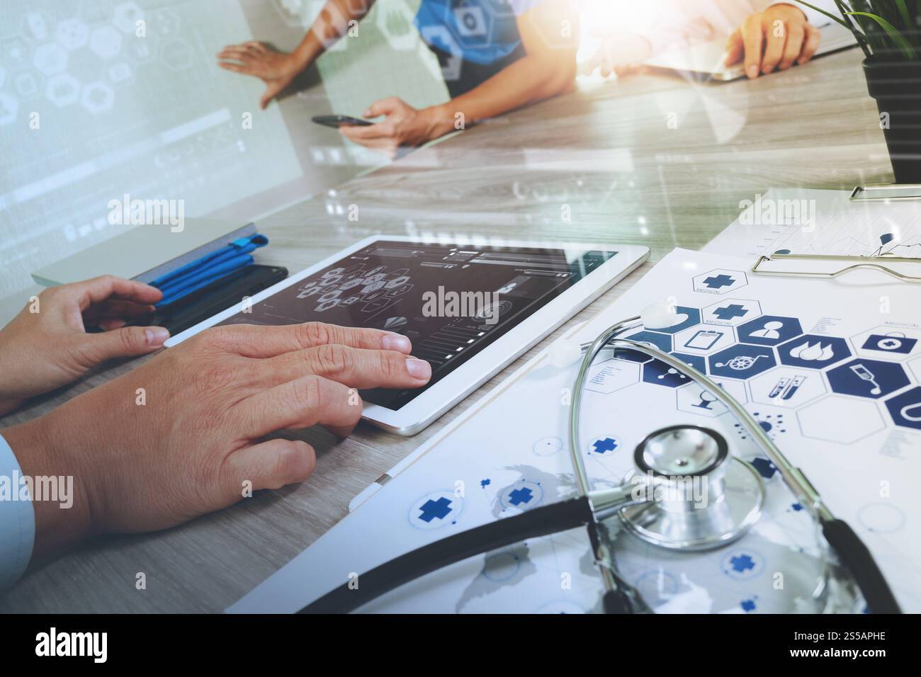 Medicine doctor hand working with modern computer and digital pro ...