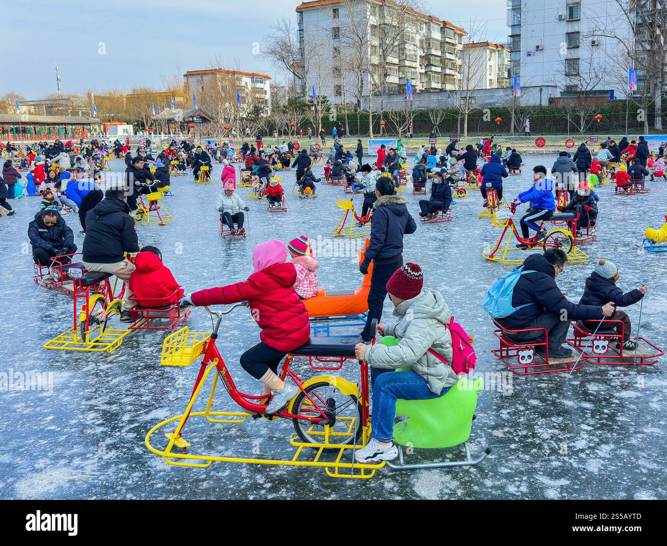 People play ice car on the frozen river in Beijing, China, 11 January ...