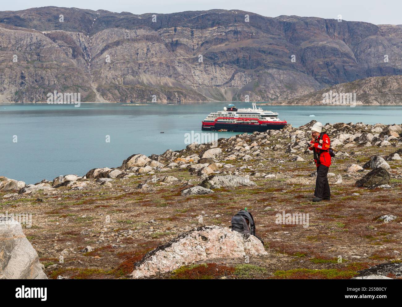 Tourist exploring Kvanefjord with Hybrid powered Hurtigruten ship MS ...