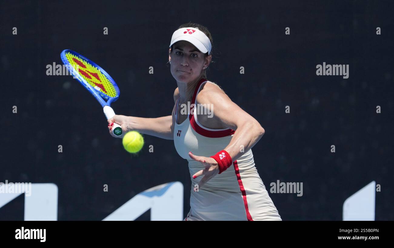 Anna Bondar of Hungary plays a forehand return to Wang Yafan of China ...