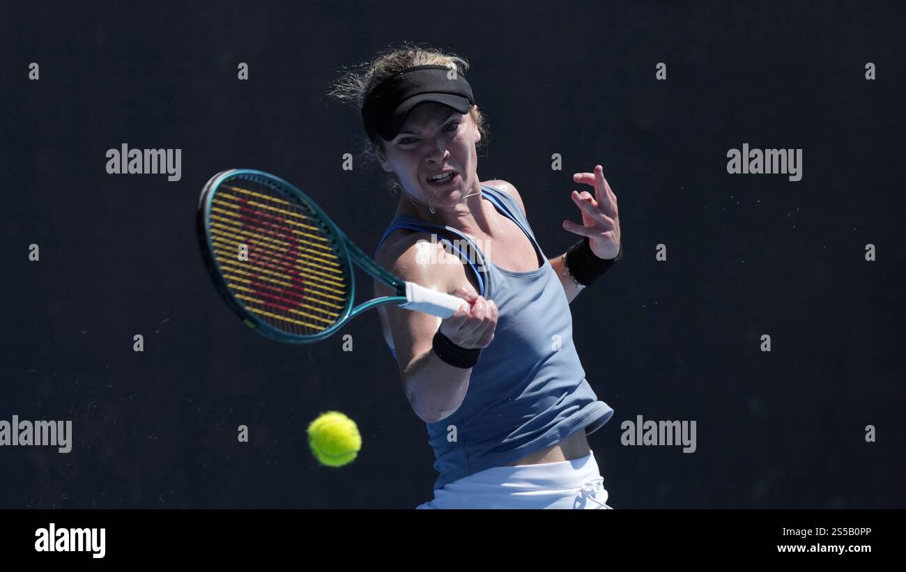 Caty McNally of the U. S. plays a forehand return to Varvara Gracheva of France during their ...