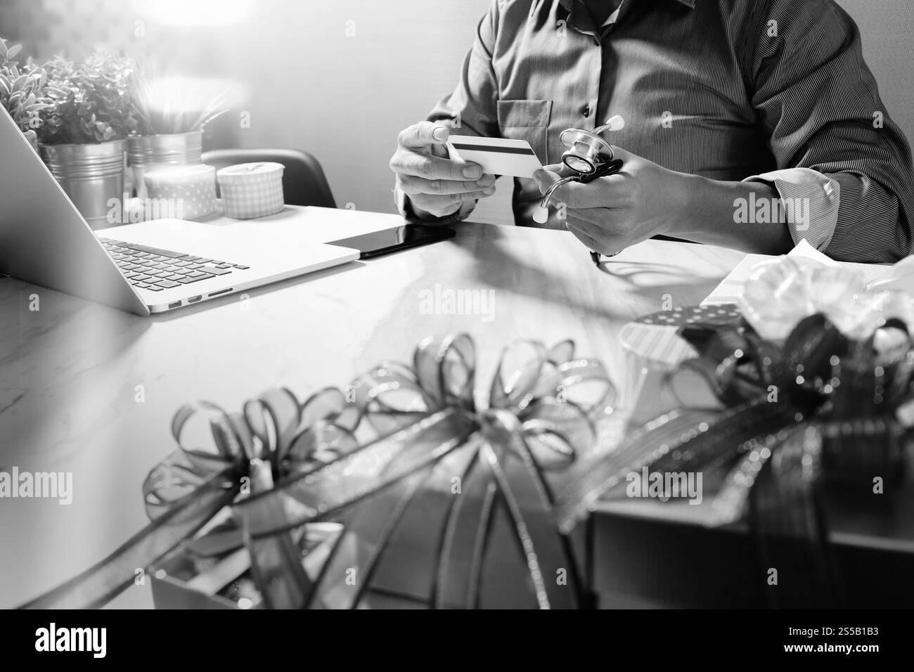 Doctor on desk Black and White Stock Photos & Images - Alamy