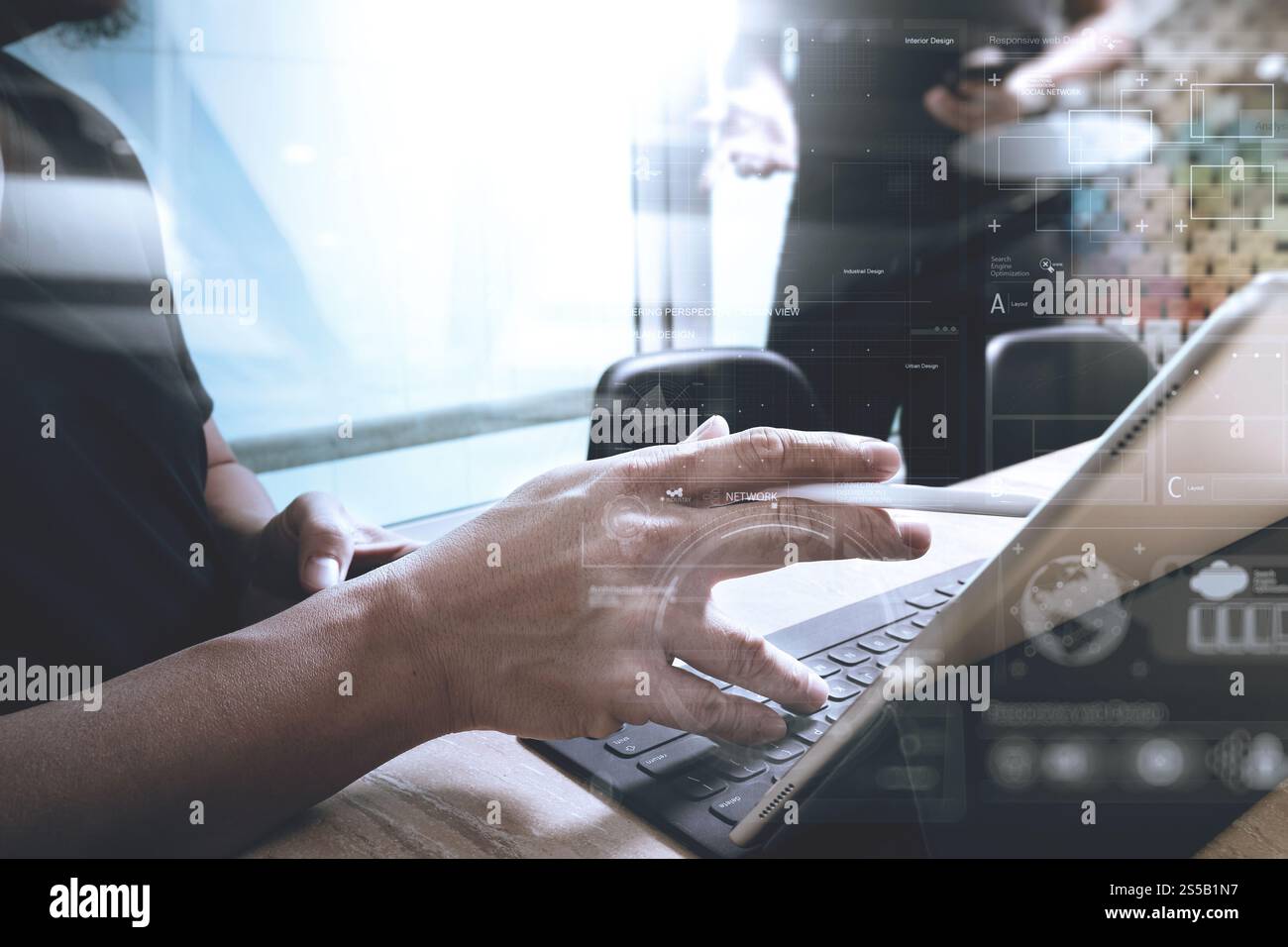 two colleague web designer discussing data and digital tablet docking ...