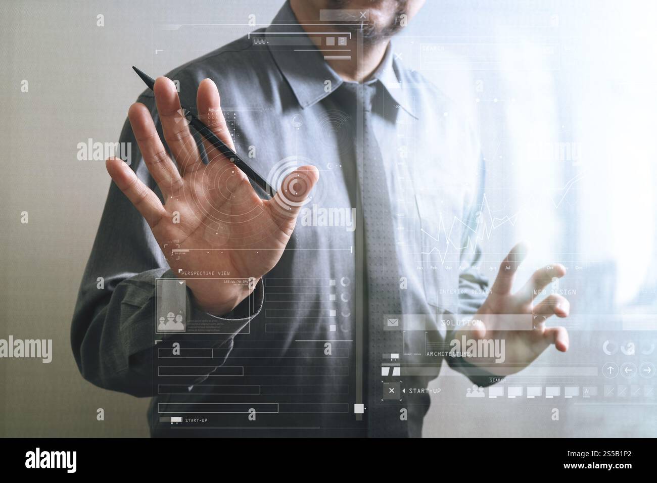 success businessman open his hand,working touch screen computer,front ...