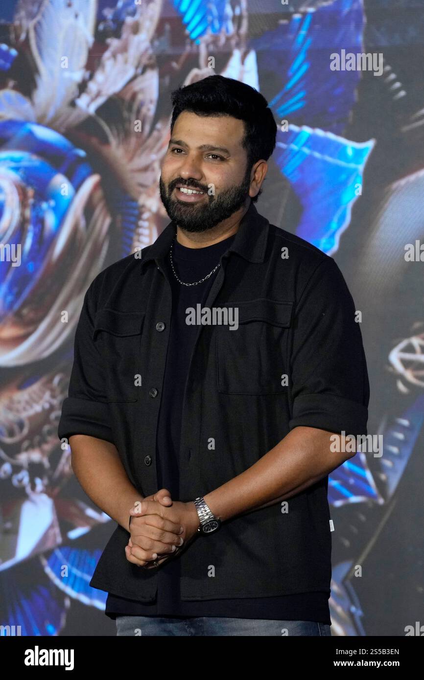 Indian cricketer Rohit Sharma smiles during a promotional event in ...