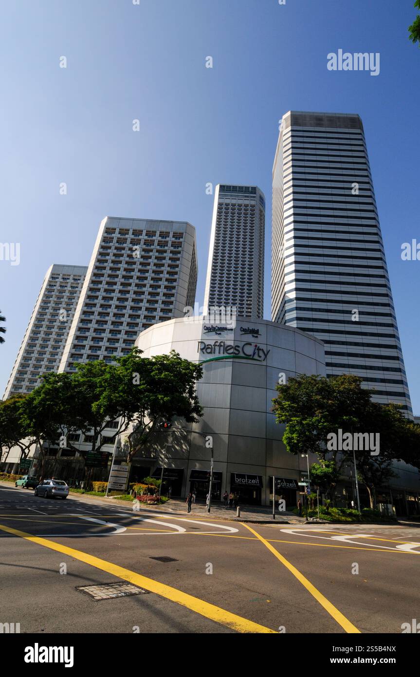 Raffles City shopping mall and the towers of the Fairmont hotel and the ...