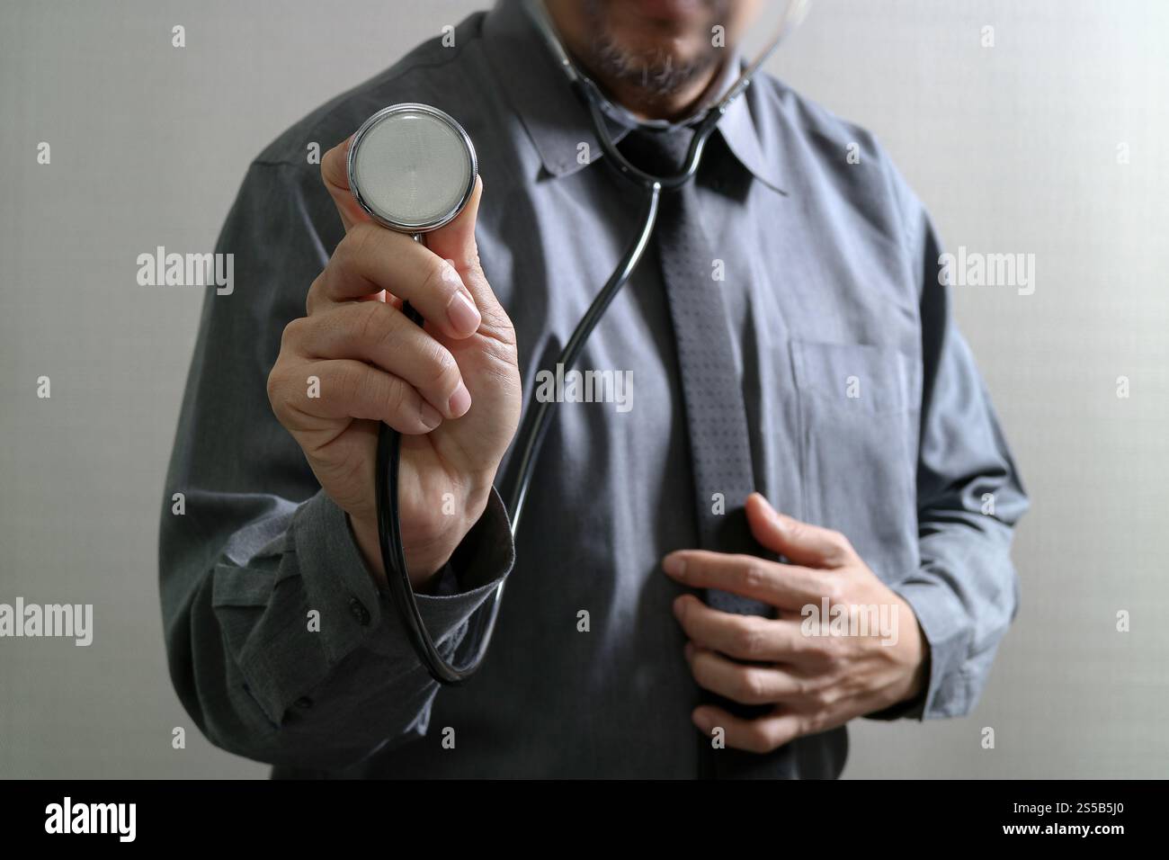 smart medical doctor holding stethoscope front view,filter effect Stock ...