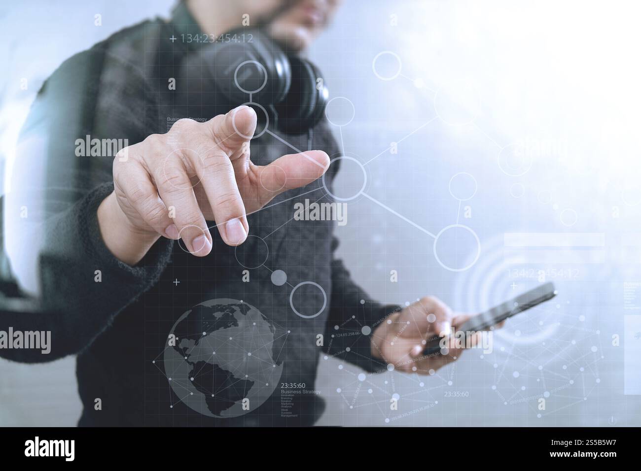 Businessman hand pressing an imaginary button,holding smart phone ...