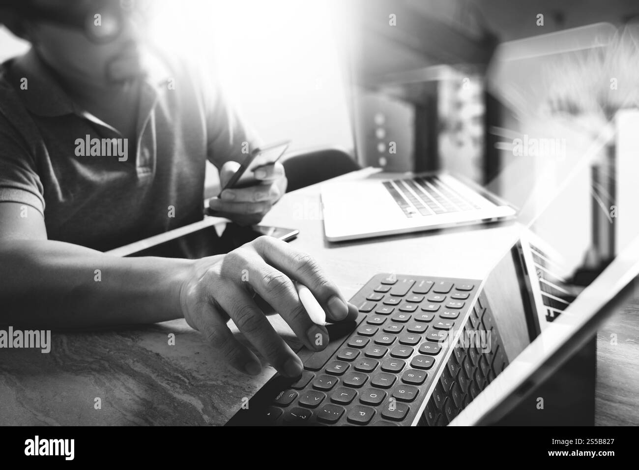 Man sitting desk working laptop Black and White Stock Photos & Images - Alamy
