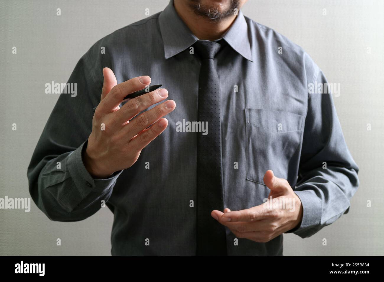 success businessman open his hand,working touch screen computer,front ...