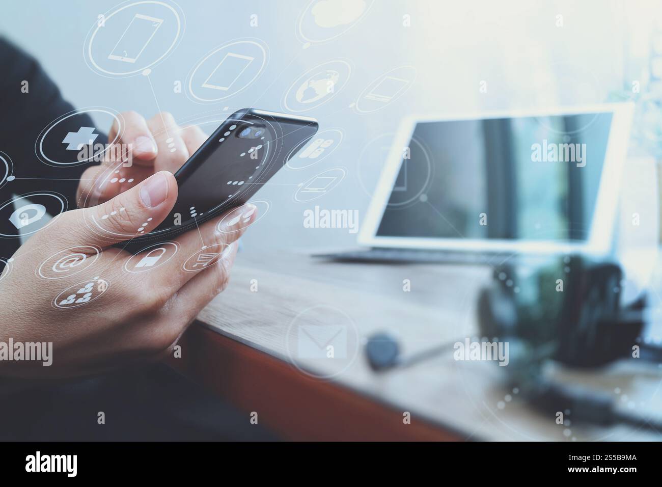 man hand using VOIP headset with digital tablet computer docking ...