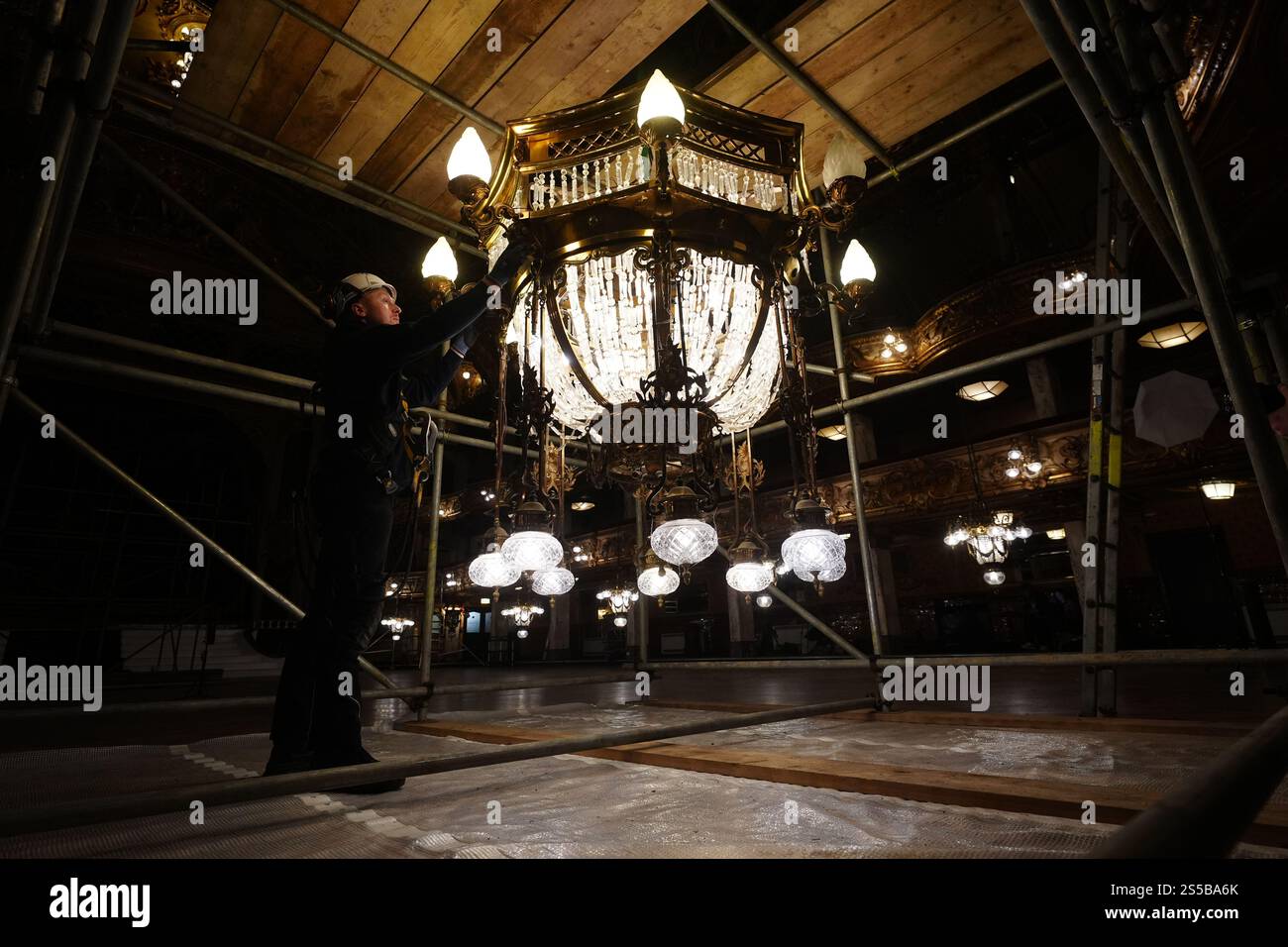 A specialist from the Tower ballroom team inspects a one-tonne ...