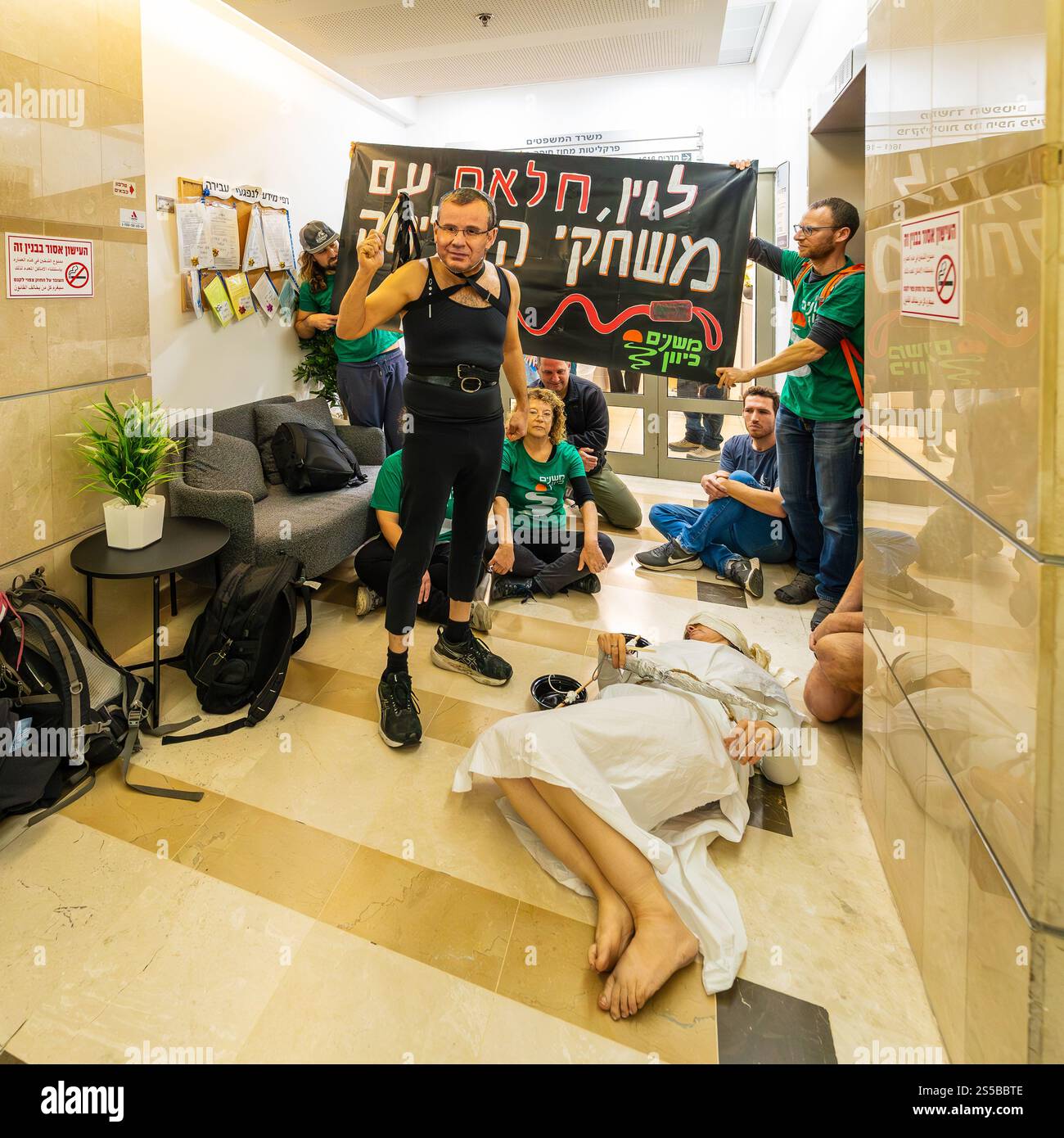 Haifa Israel - January 13, 2025: Activists of changing directions group perform symbolic control ...