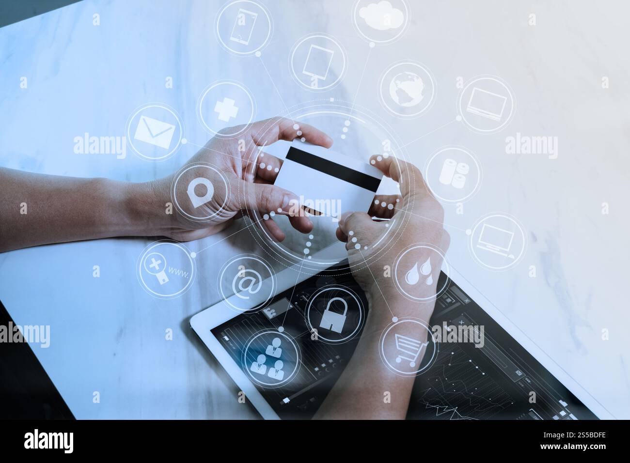 hand using credit cardr with digital tablet computer in modern office ...