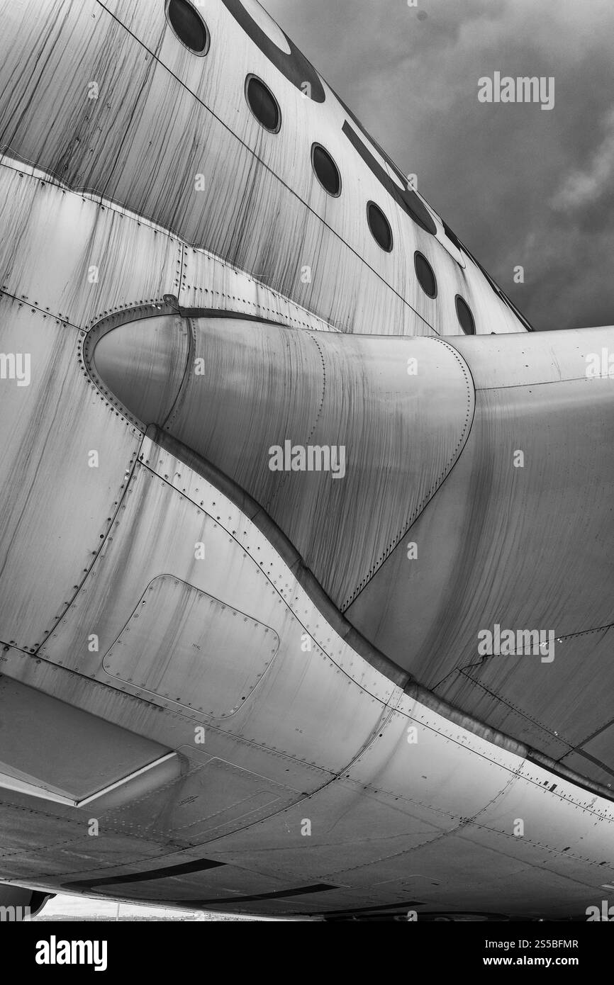 close-up view of the fuselage of an airplane. Taken from an angle that ...