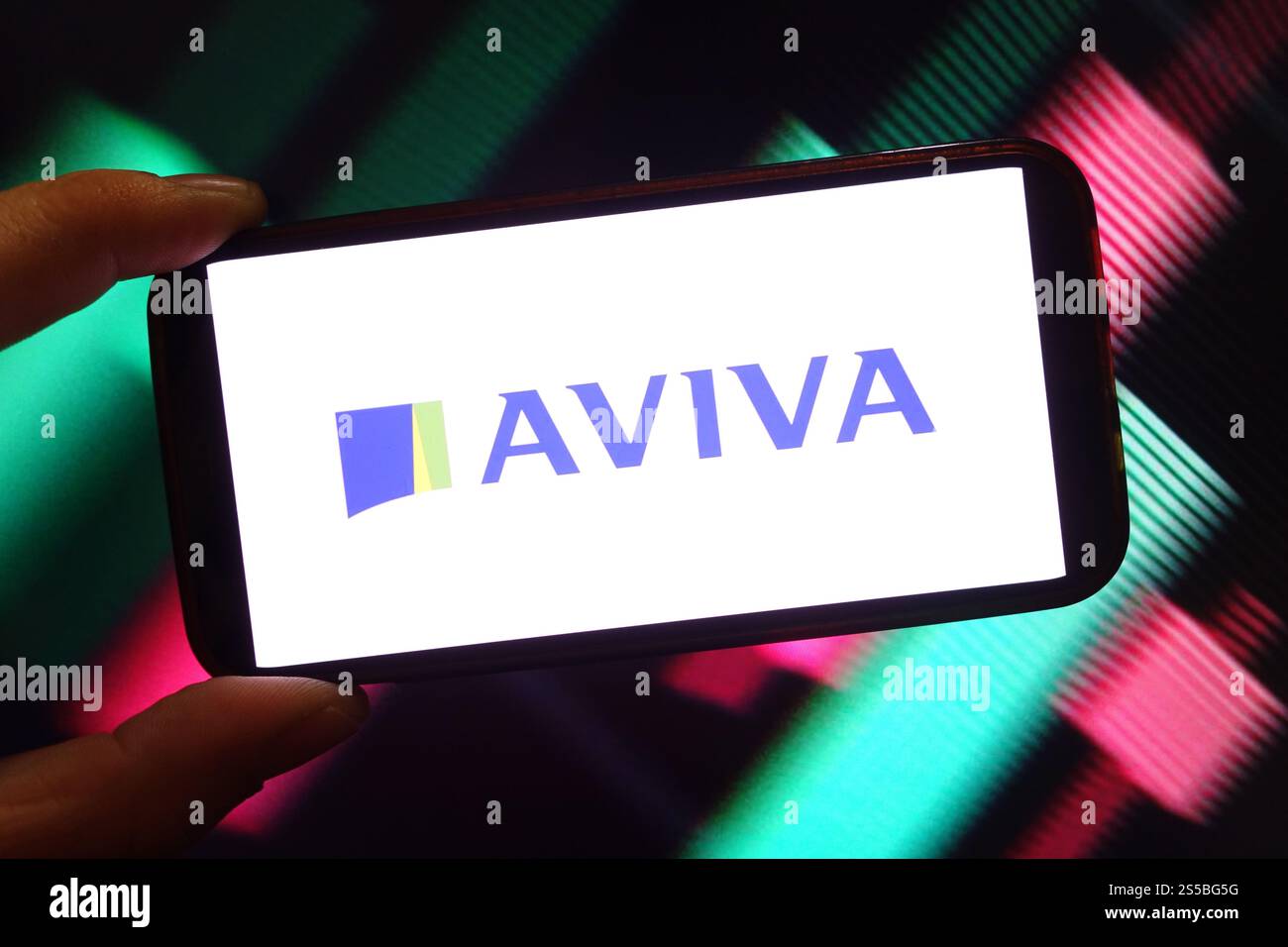 In this photo illustration, the Aviva company logo is seen displayed on ...