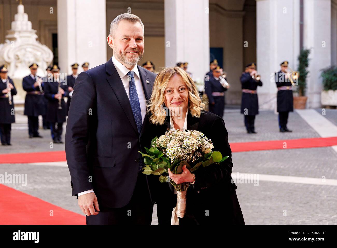 Italy's Prime Minister Giorgia Meloni, right, and the President of ...