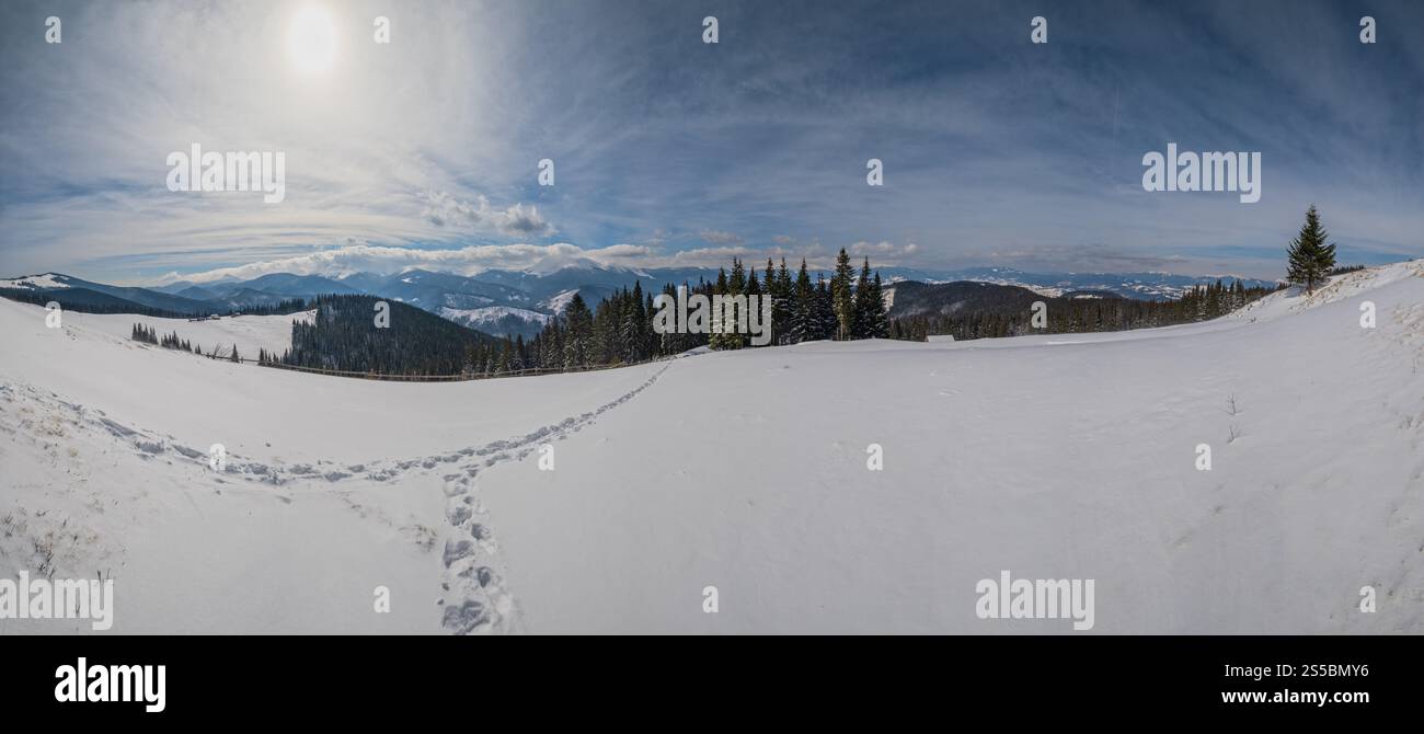 Winter remote alpine mountain village outskirts, countryside hills ...