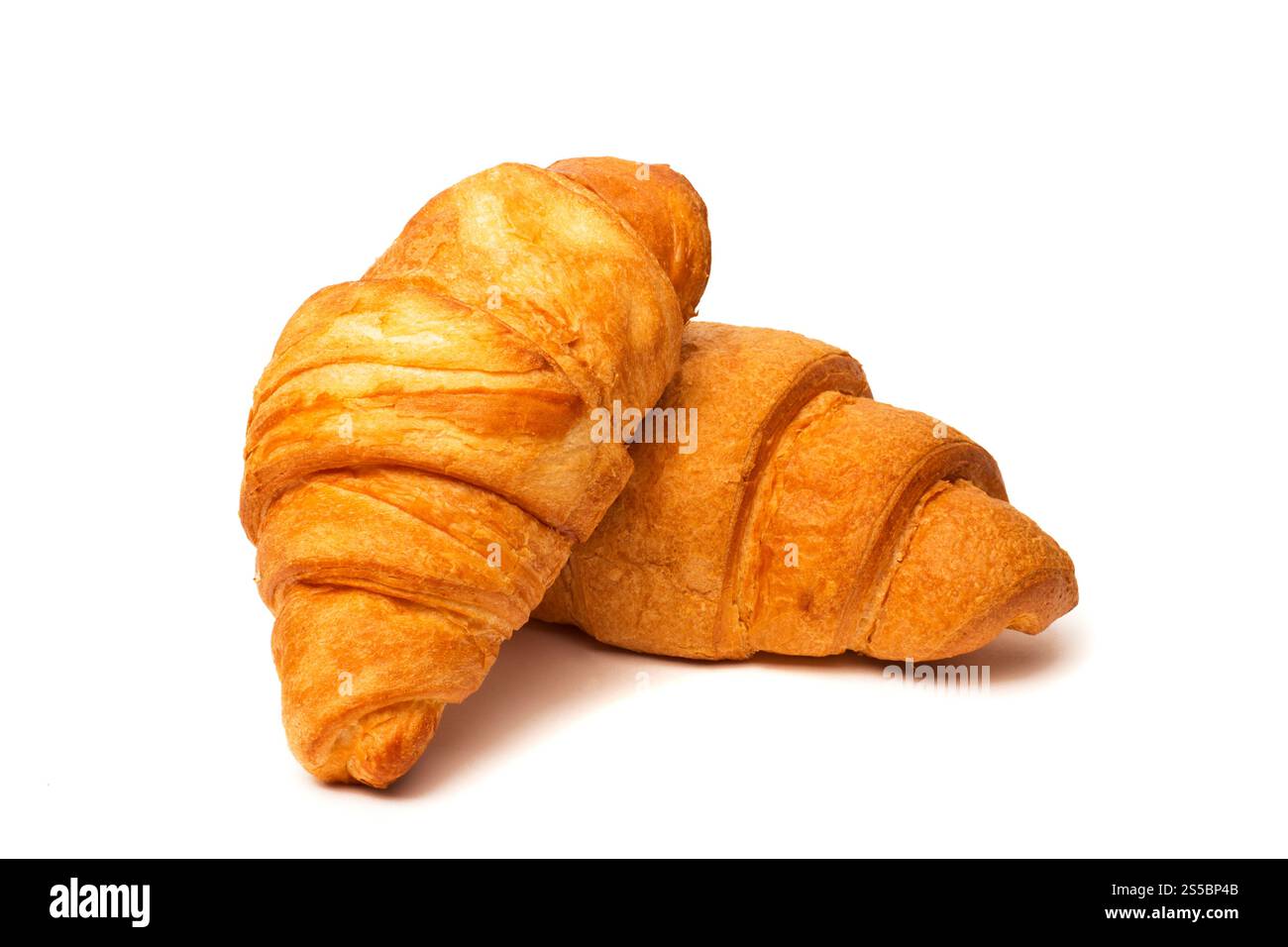 two croissants isolated on white background. two croissants isolated ...