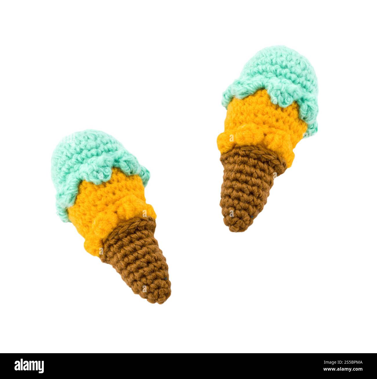two different flavor ice creams with cone on white. two different ...