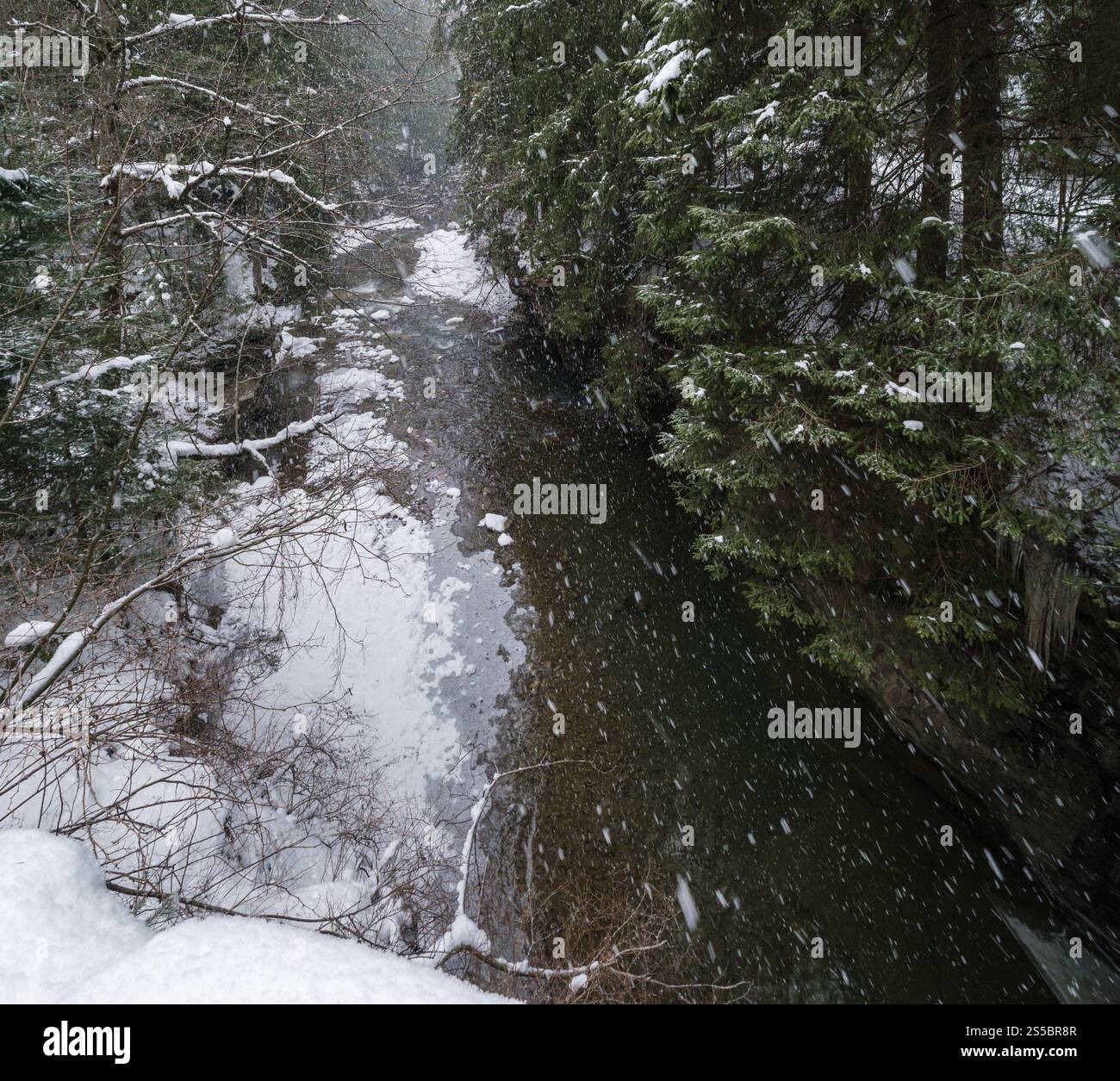 River running through snowy mountain hi-res stock photography and ...