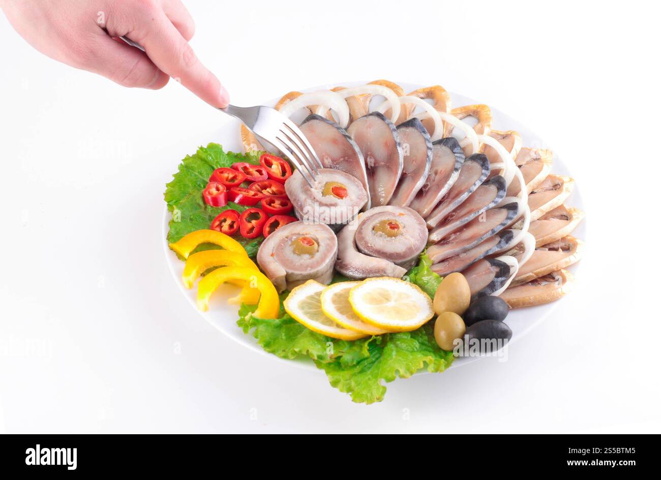 taste fresh fish on dish isolated on white background. taste fresh fish ...