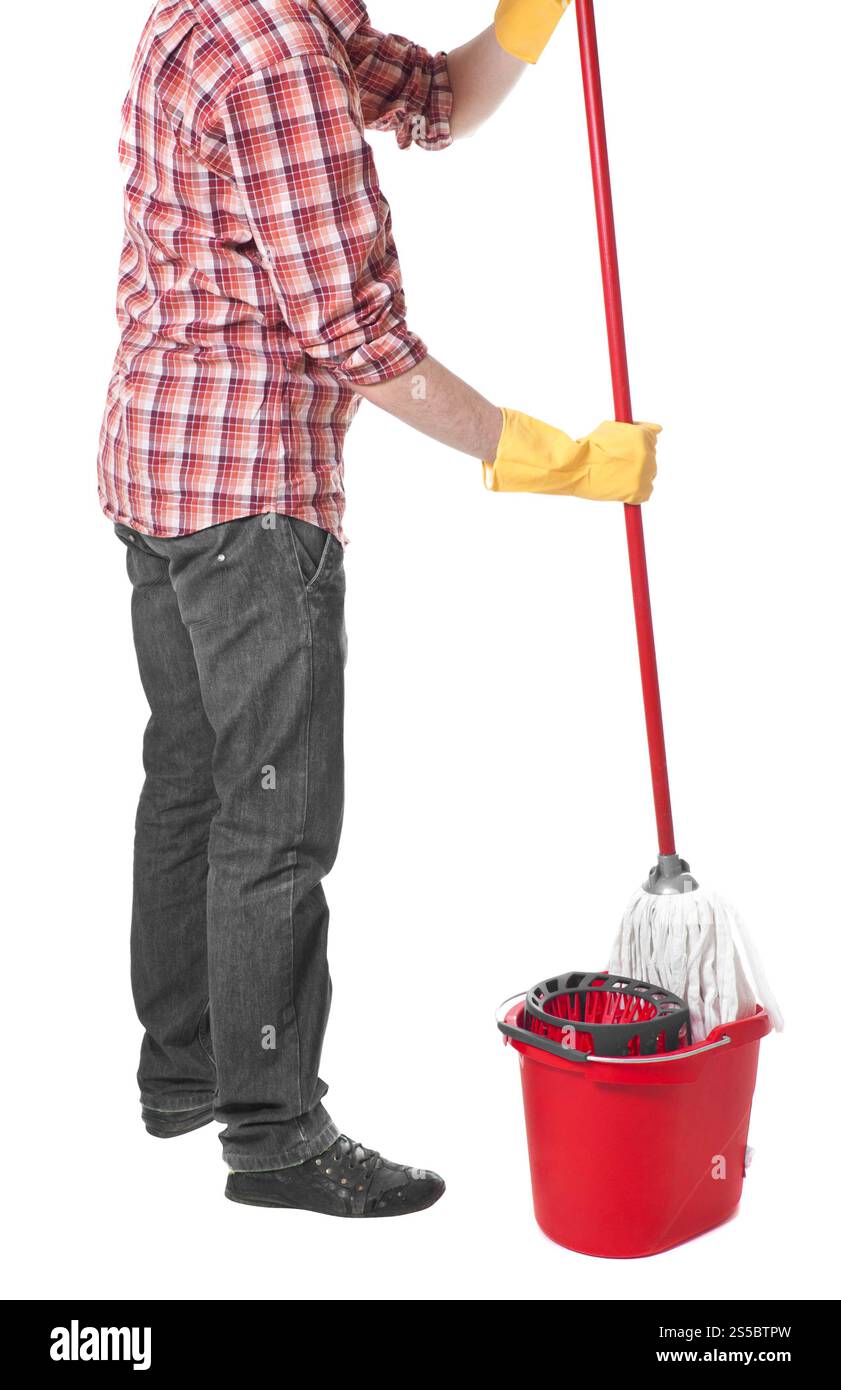 man puts the mop in a bucket isolated on white background. man puts the ...