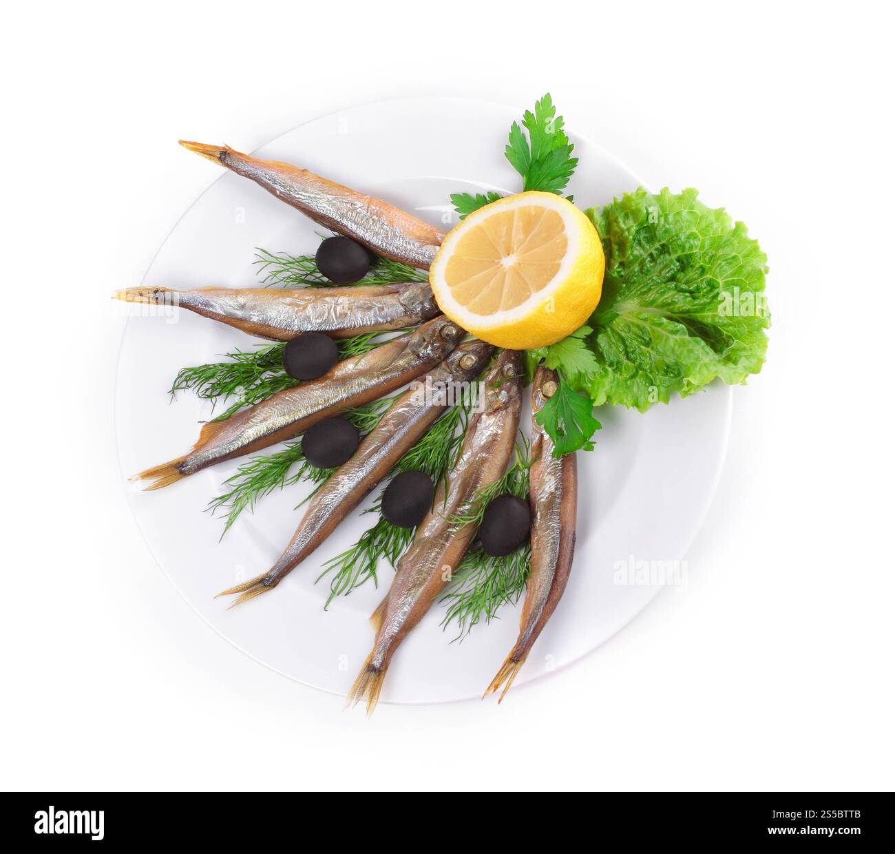 kipper fish on composition with vegetables isolated on white background ...