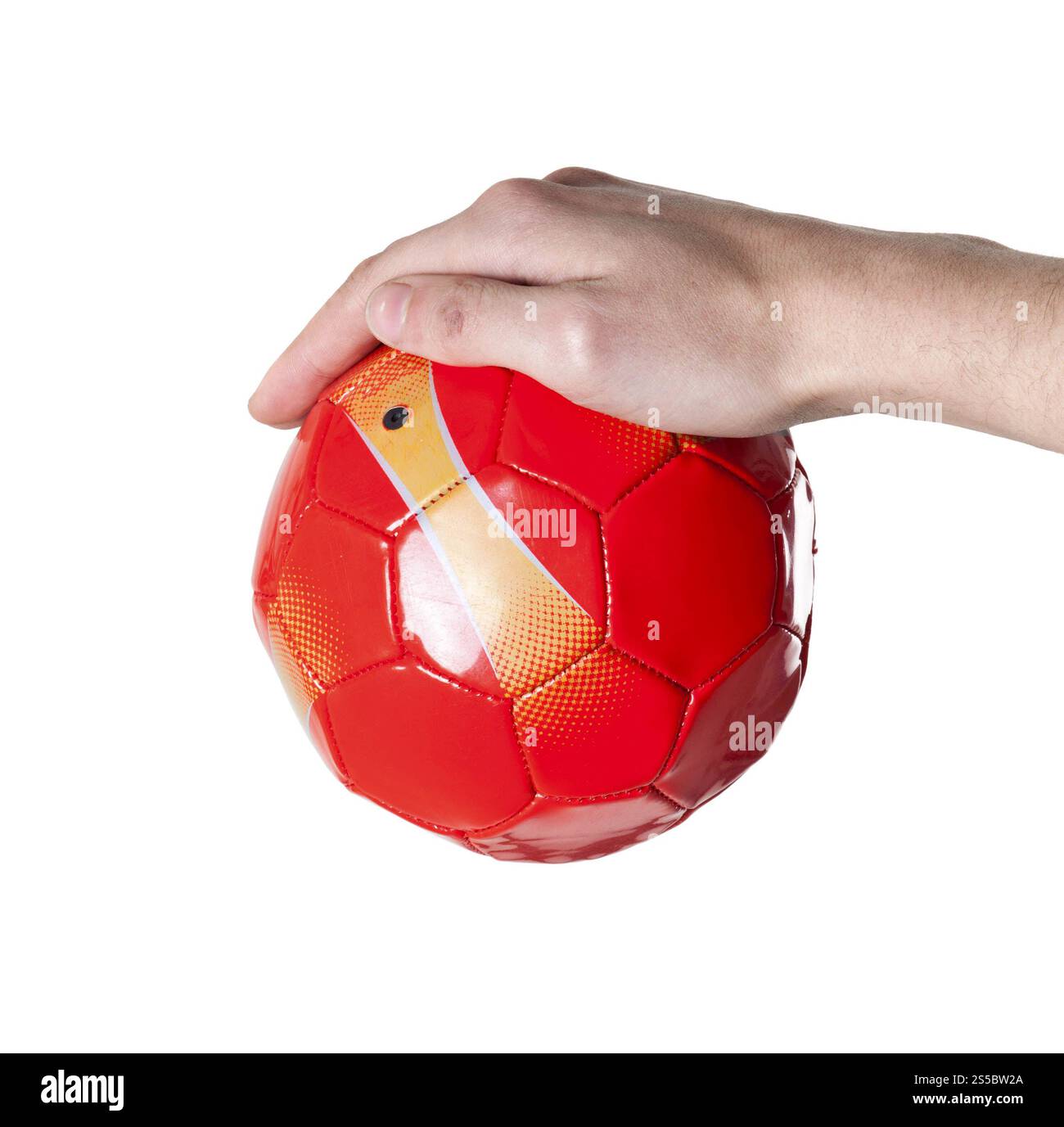 small soccer red ball in hand isolated on white background. small ...
