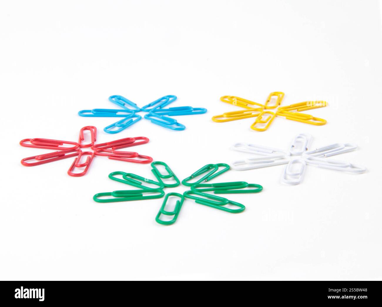 Office - Colored staples isolated on white background. Office - Colored ...