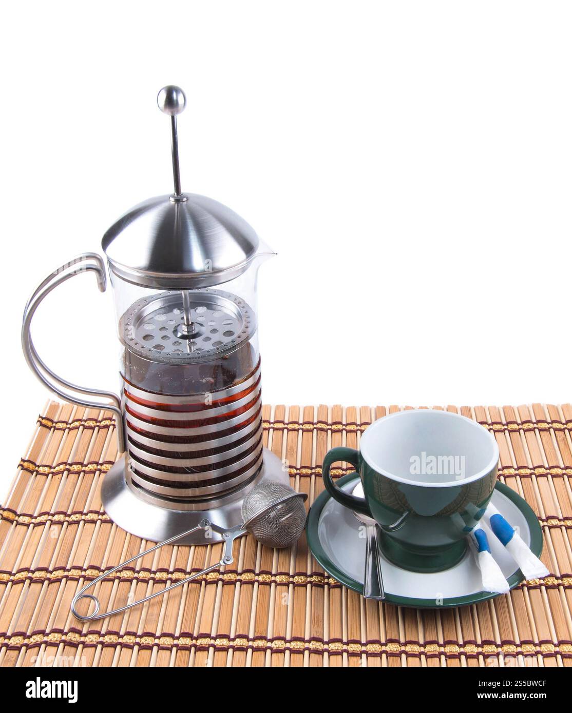 empty cup against Brewed tea isolated on white background. empty cup ...