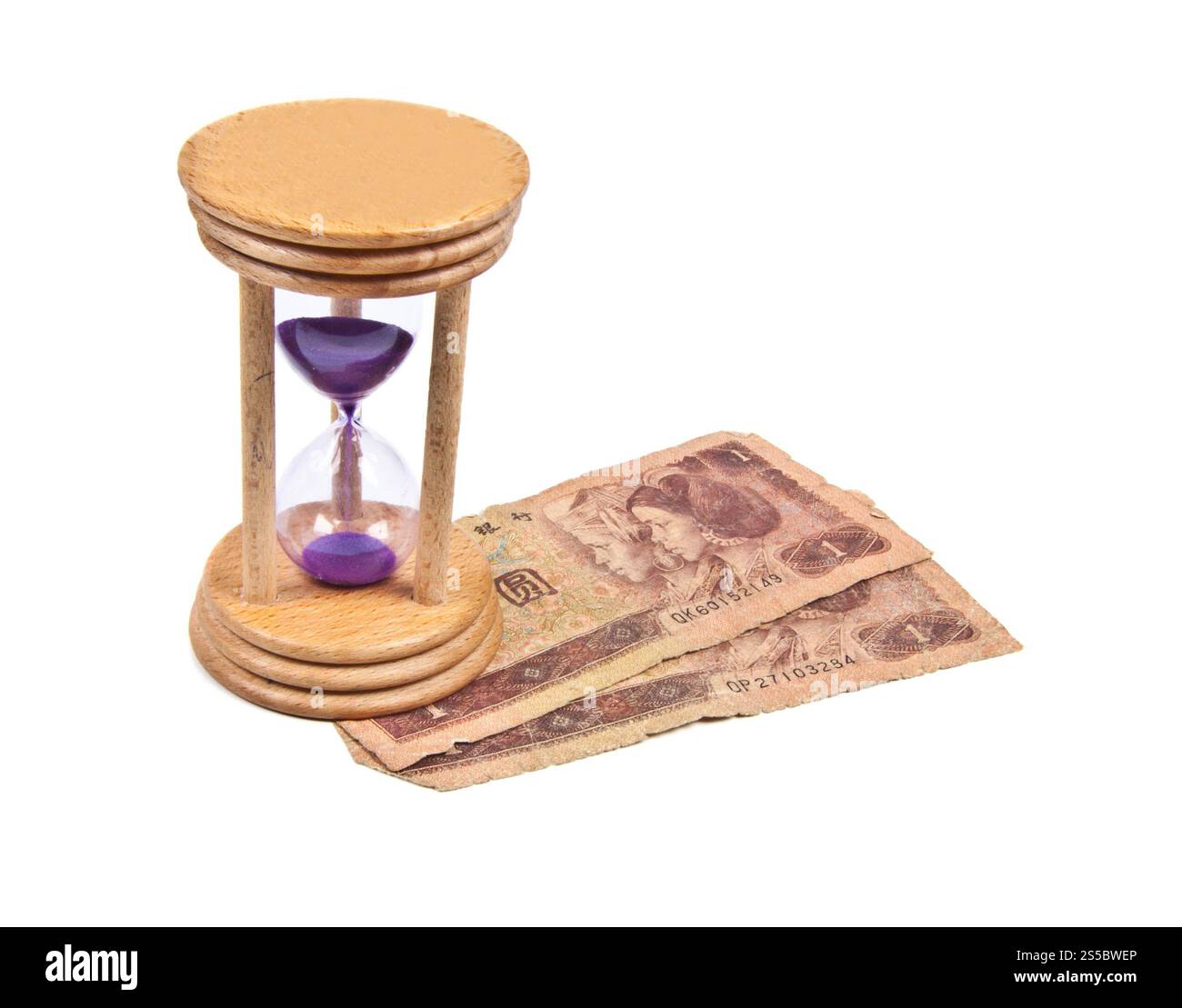 Hour Glass with old money isolated on white background. Hour Glass with ...