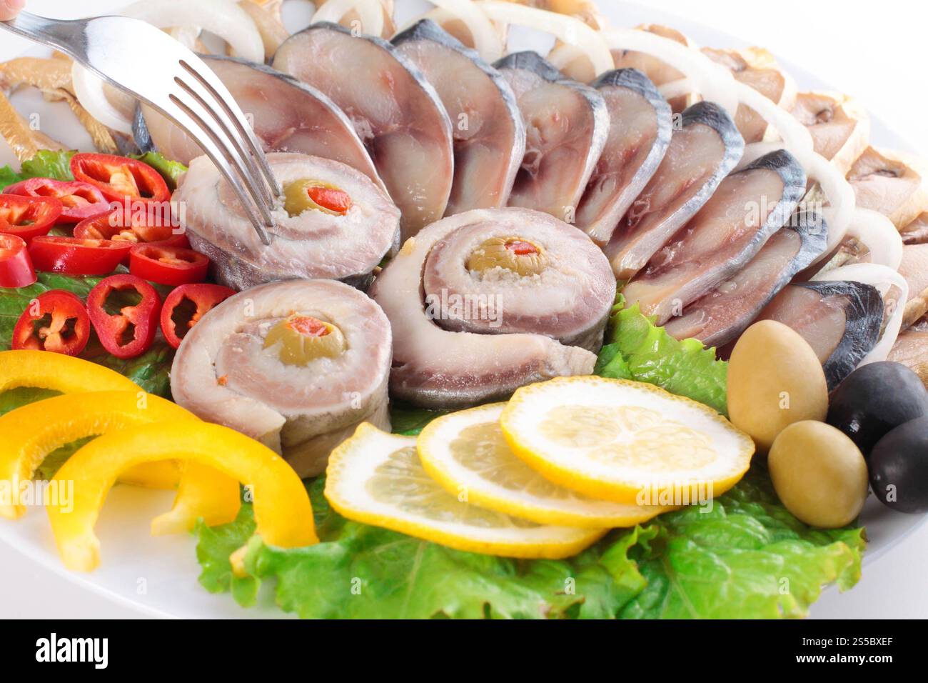 fish with vegetables,anion red pepper isolated on white background ...
