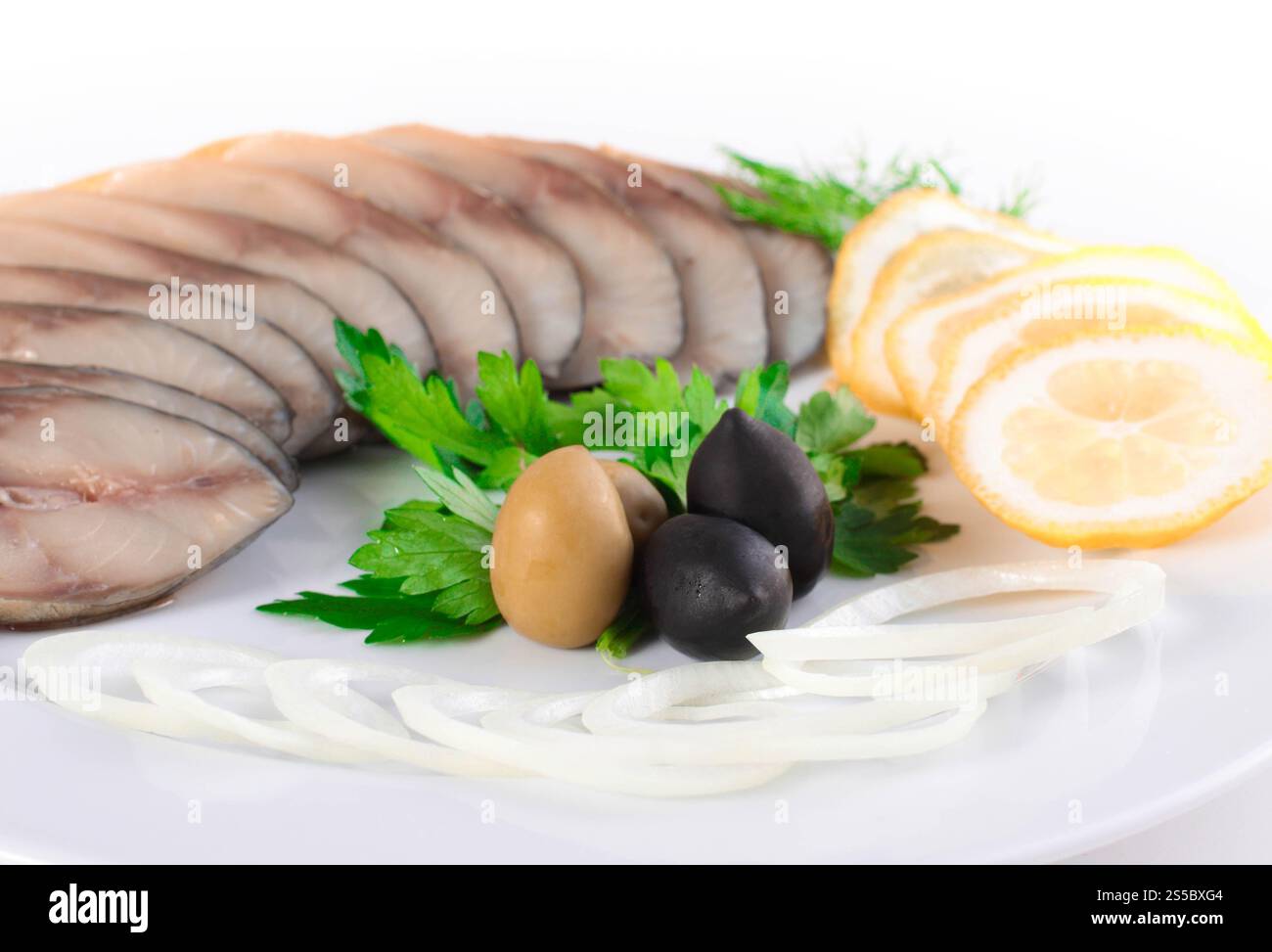 fish with vegetables,anion olives isolated on white background. fish ...