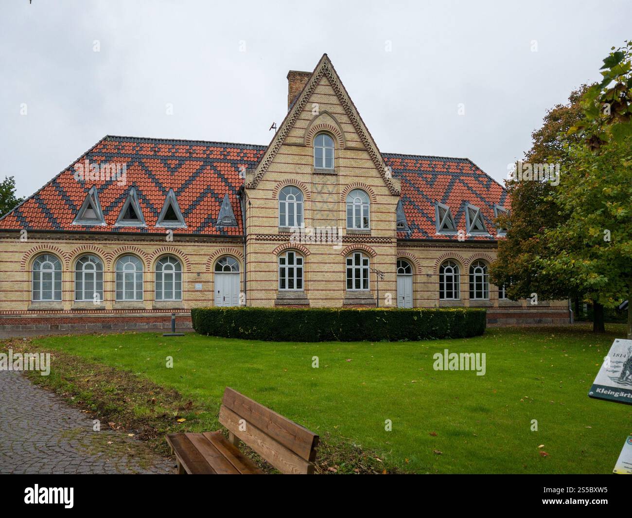 View of typical North German houses on a rainy day in autumn, in ...