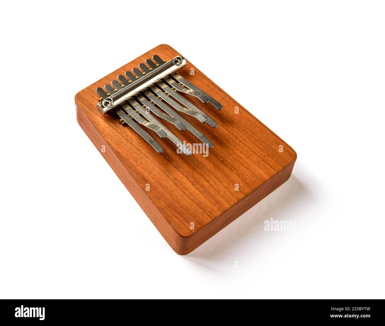 Traditional wooden kalimba isolated on white background. Traditional ...