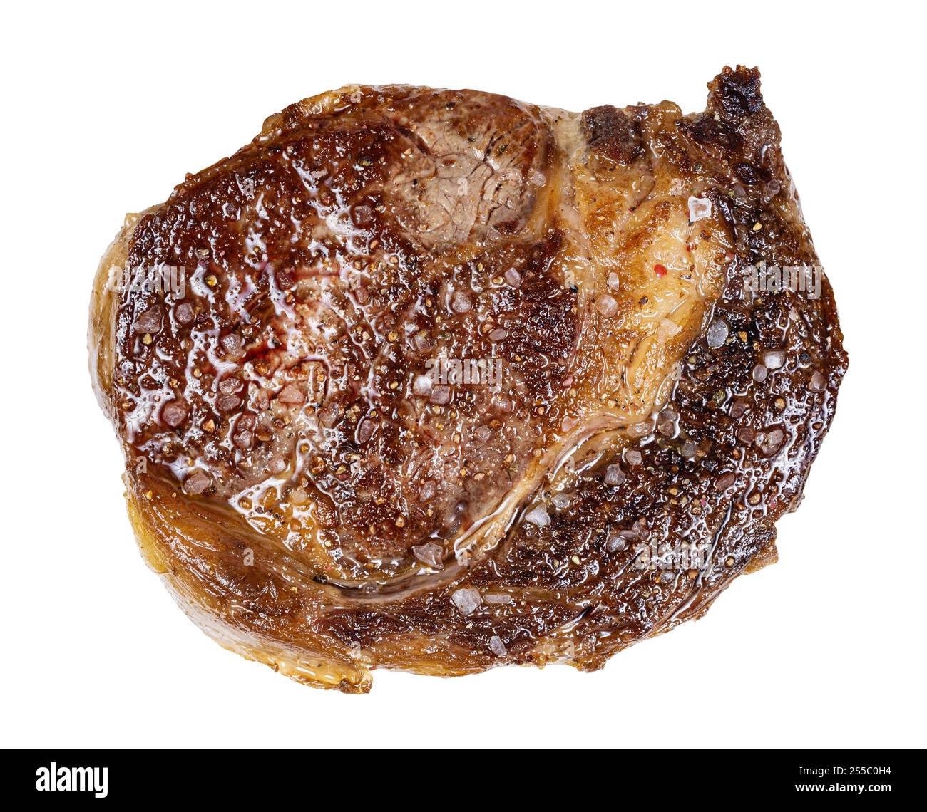 top view of cooked rib eye beef steak from Aberdeen Angus bull isolated ...