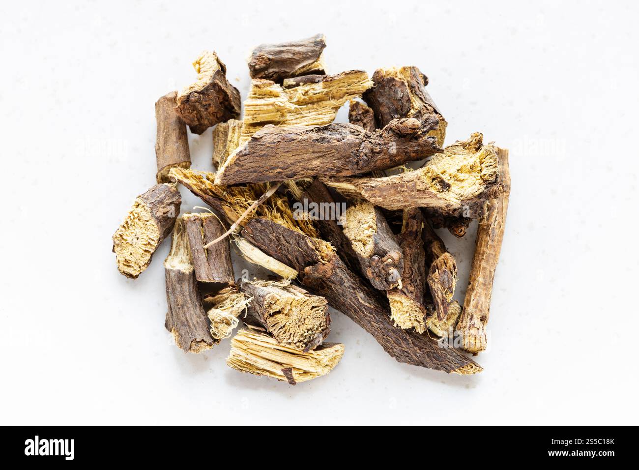 top view of pile of dried Liquorice roots on white background Stock ...