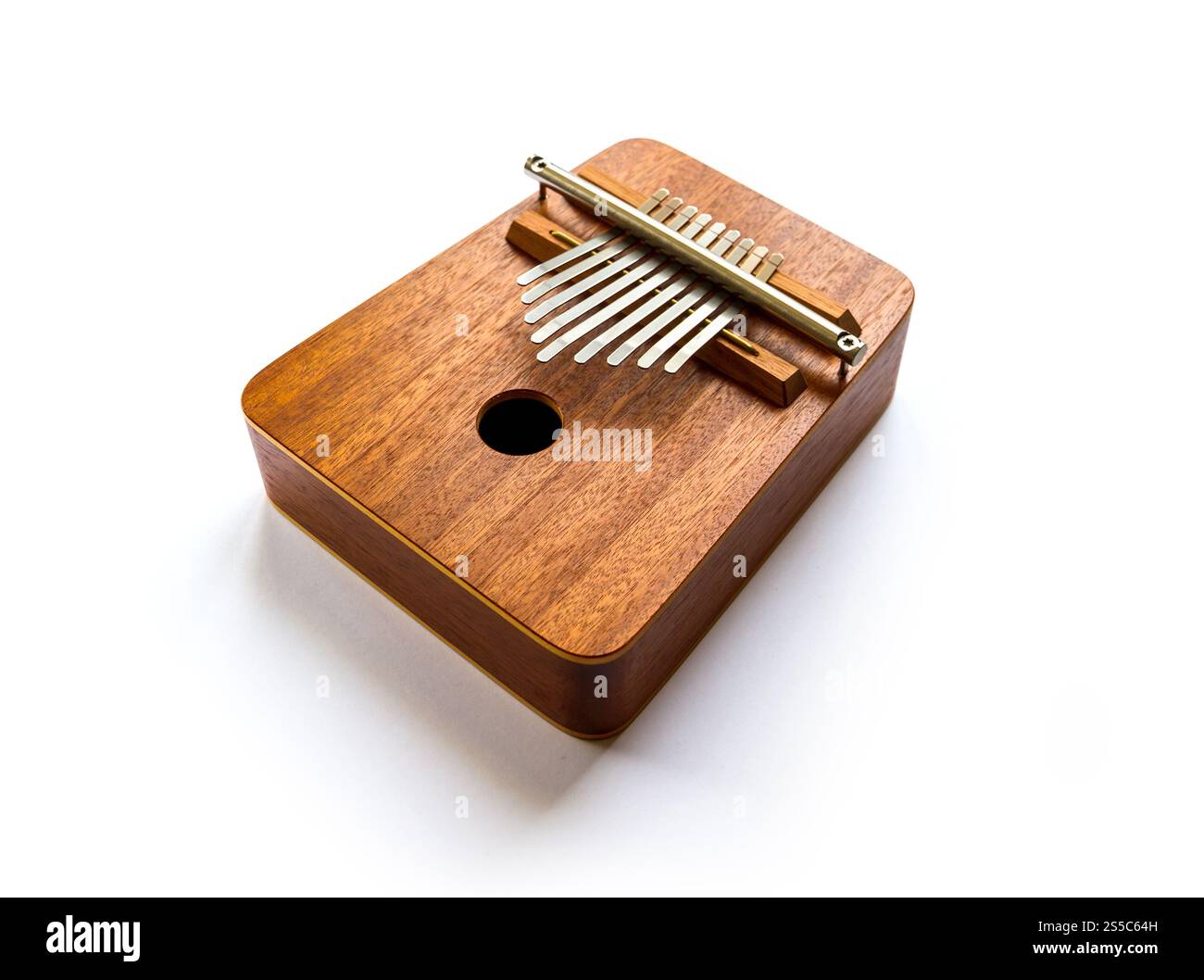 Traditional wooden kalimba isolated on white background. Traditional ...