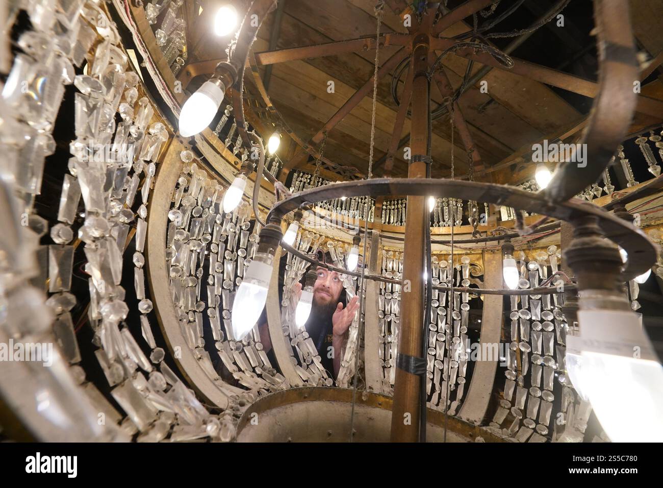 Jason Cardwell from the Tower ballroom team inspects the inside of a ...