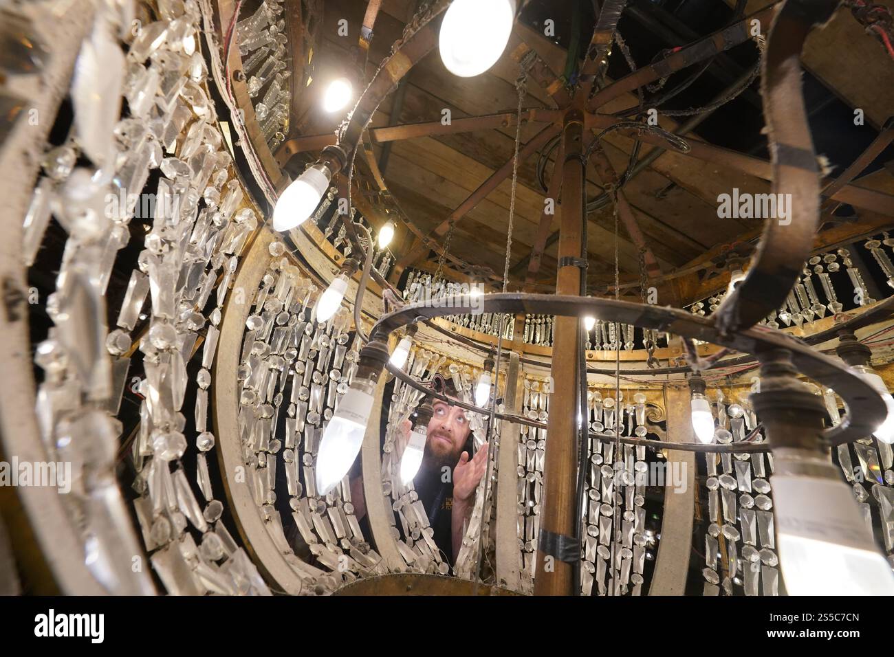 Jason Cardwell from the Tower ballroom team inspects the inside of a ...