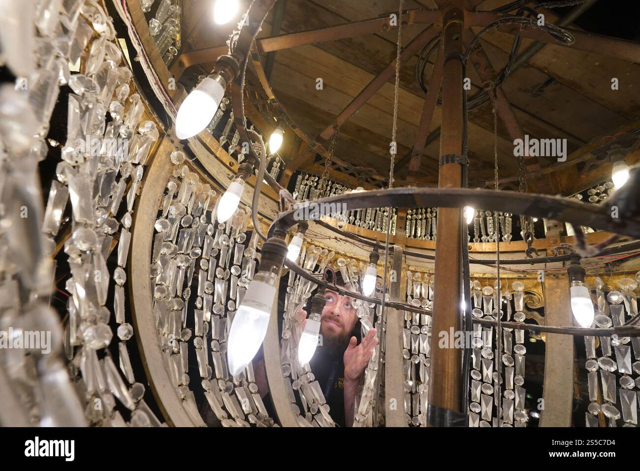 Jason Cardwell from the Tower ballroom team inspects the inside of a ...