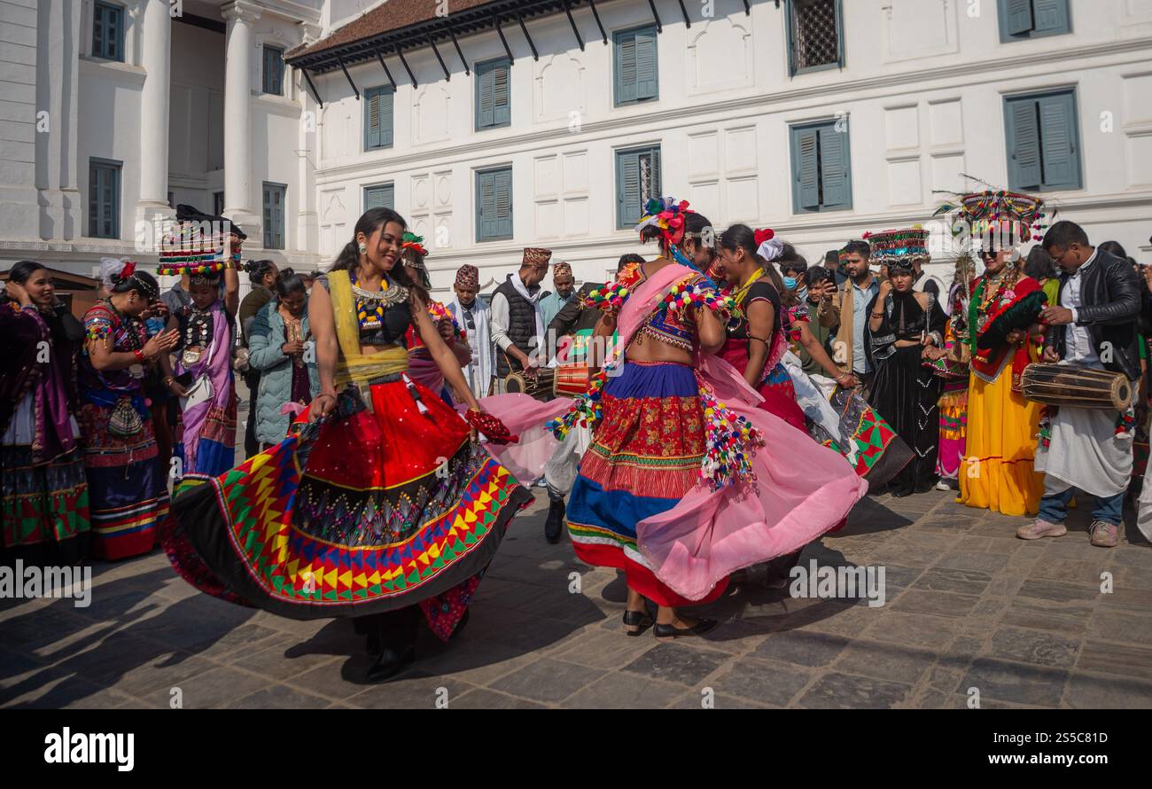 Kathmandu, Nepal. 14th Jan, 2025. Members from tharu community dressed ...