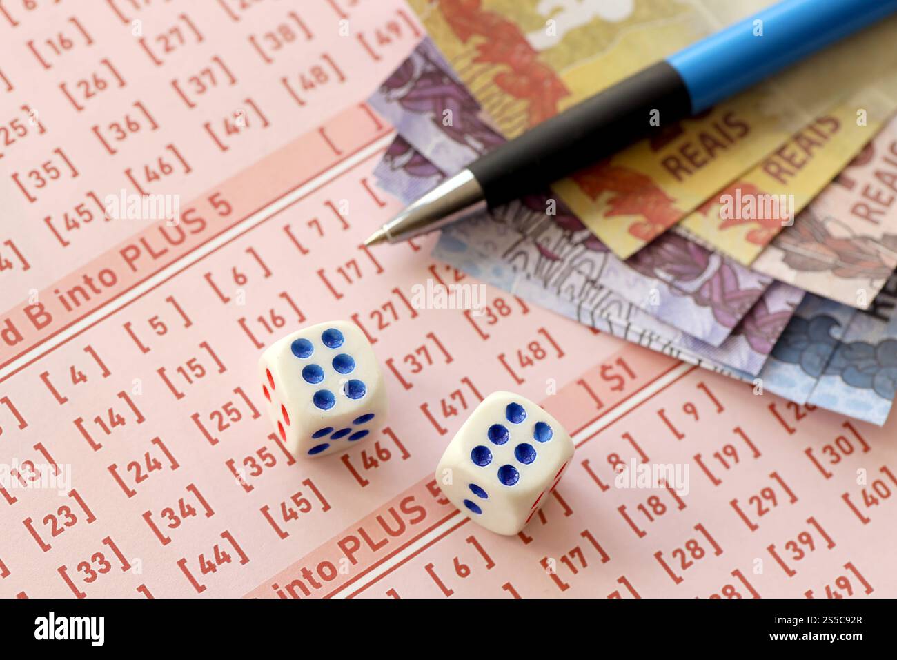 A modern web camera is installed on the body of a flat screen monitor ...