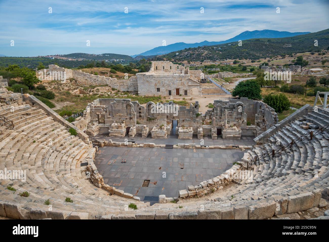 Ancient Roman Amphitheater Ruins with Stone Seats and Scenic Landscape ...
