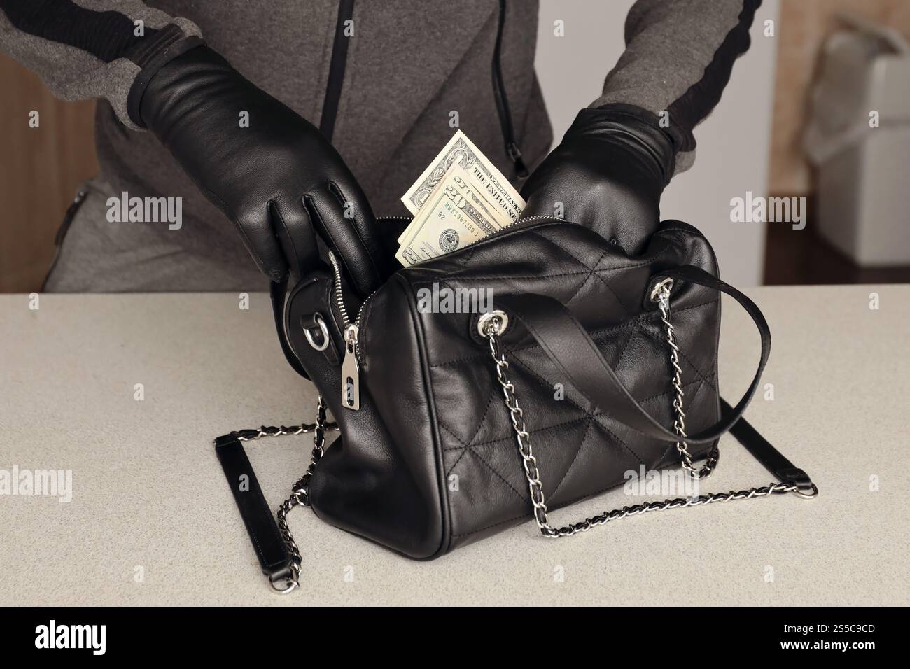 The pen, bitcoins and dollar bills is lies on the tax form 1040 U.S ...
