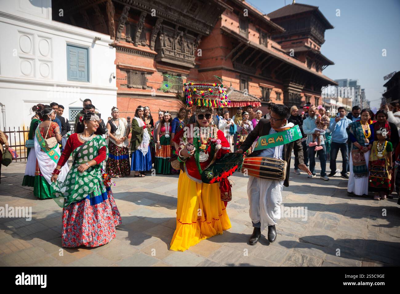 Kathmandu, Nepal. 14th Jan, 2025. Members from tharu community dressed ...